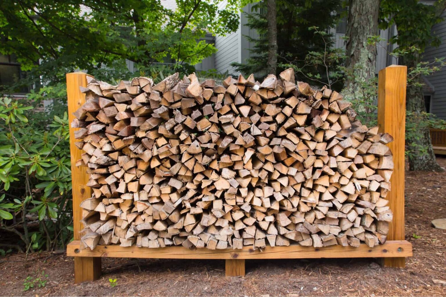 How To Stack the [PERFECT] Firewood for Your Fire Pit - Clever Patio