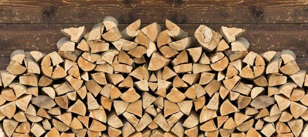 How To Stack the [PERFECT] Firewood for Your Fire Pit - Clever Patio